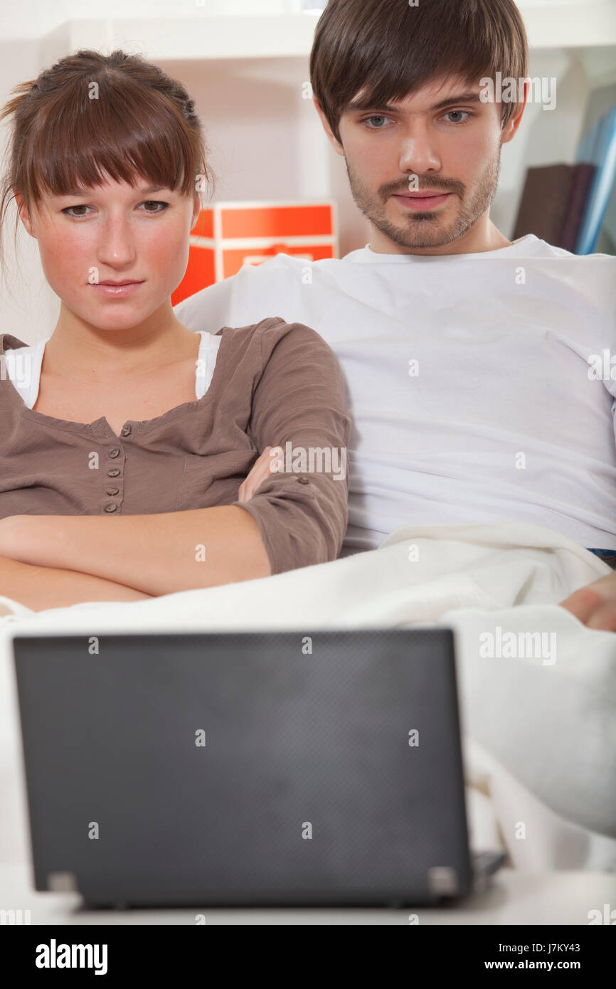 laptop notebook computers computer entertainment couple pair watching ...