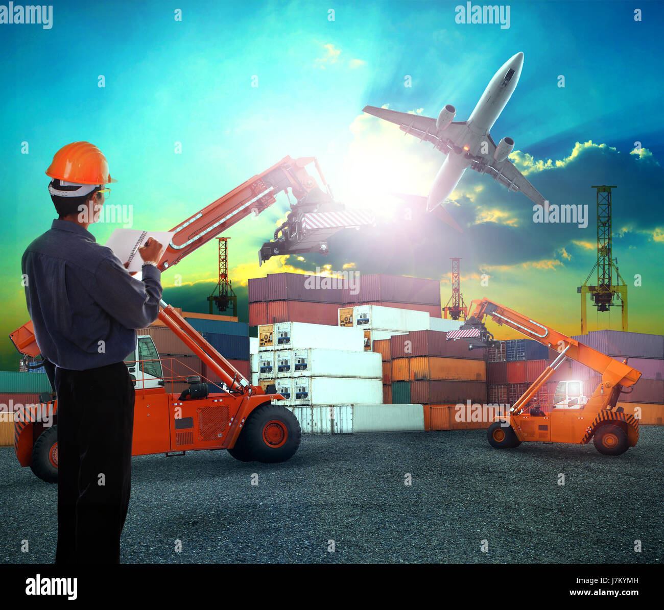 working man in logistic business working in container shipping yard ...