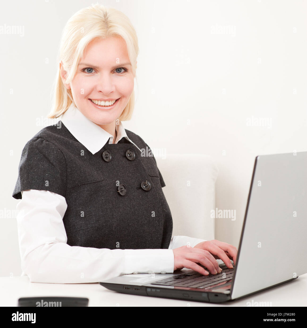woman office laptop notebook computers computer laugh laughs laughing ...