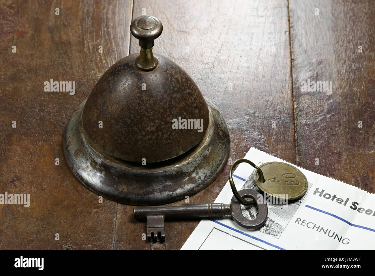 vintage German hotel bill at counter with room key and service bell ...