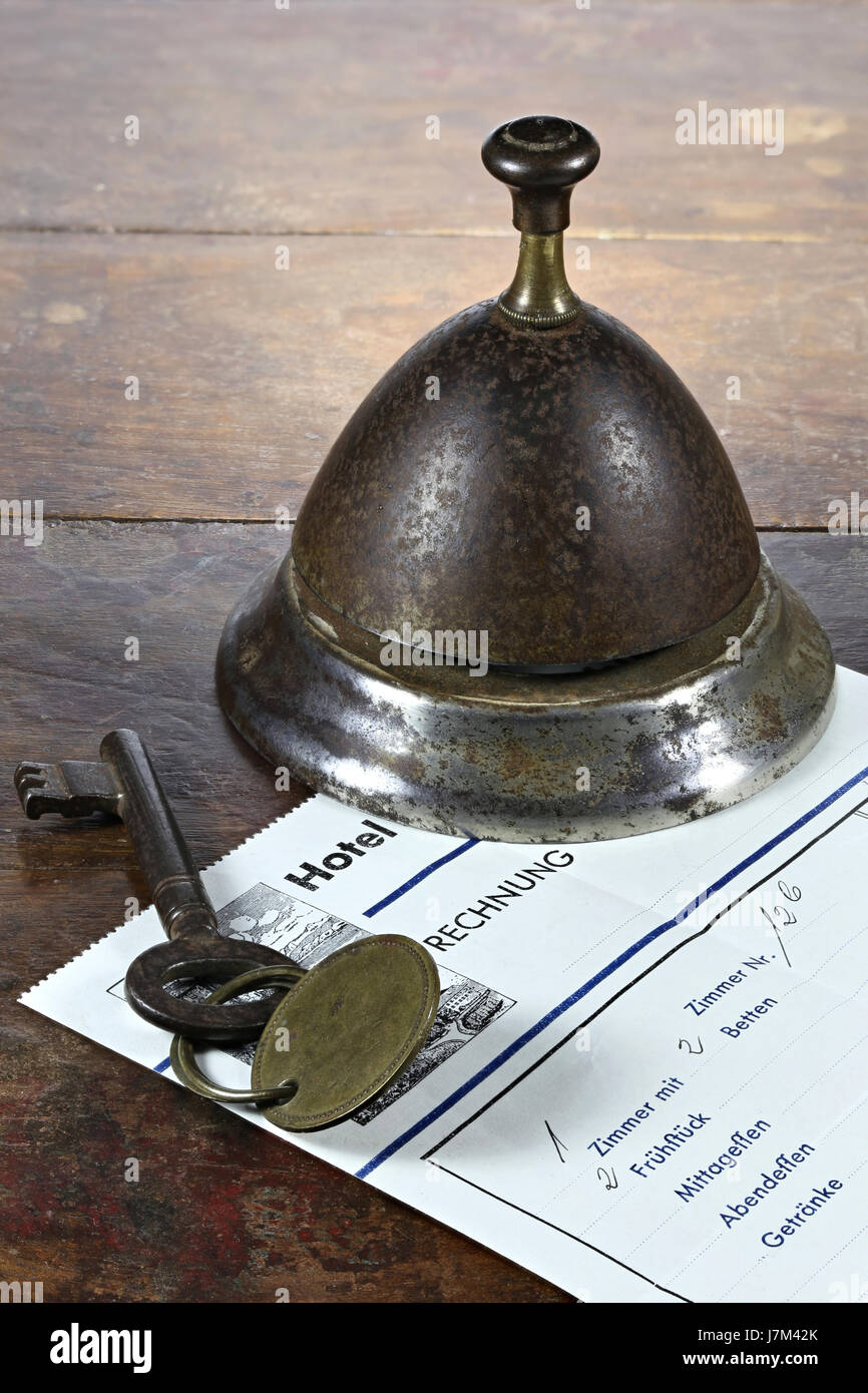 vintage German hotel bill at counter with room key and service bell ...