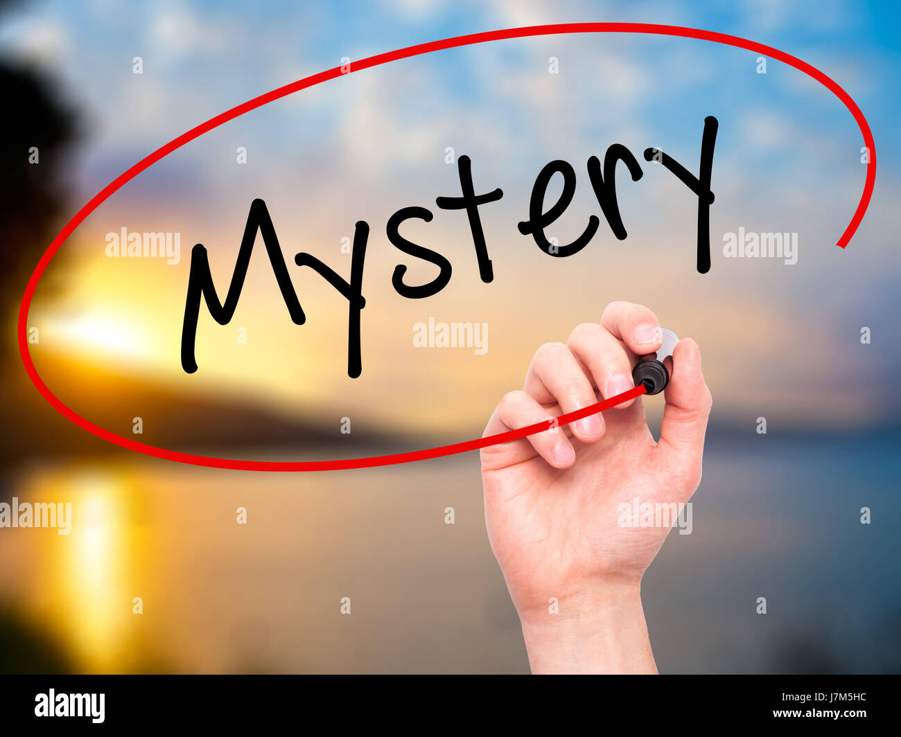 Man Hand writing Mystery with black marker on visual screen. Isolated ...