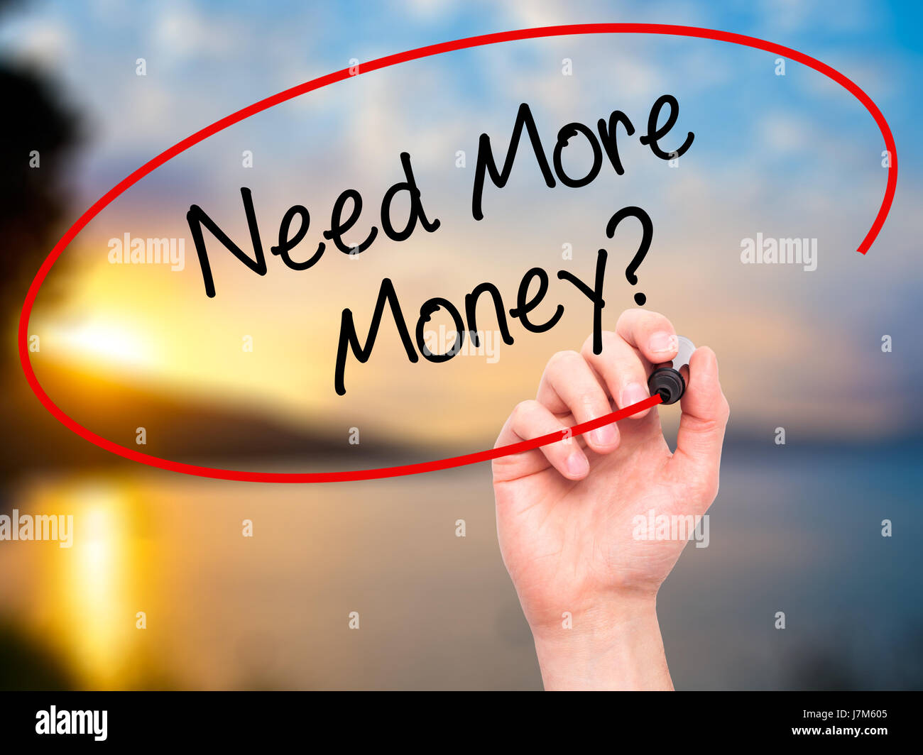 Man Hand writing Need More Money? with black marker on visual screen ...