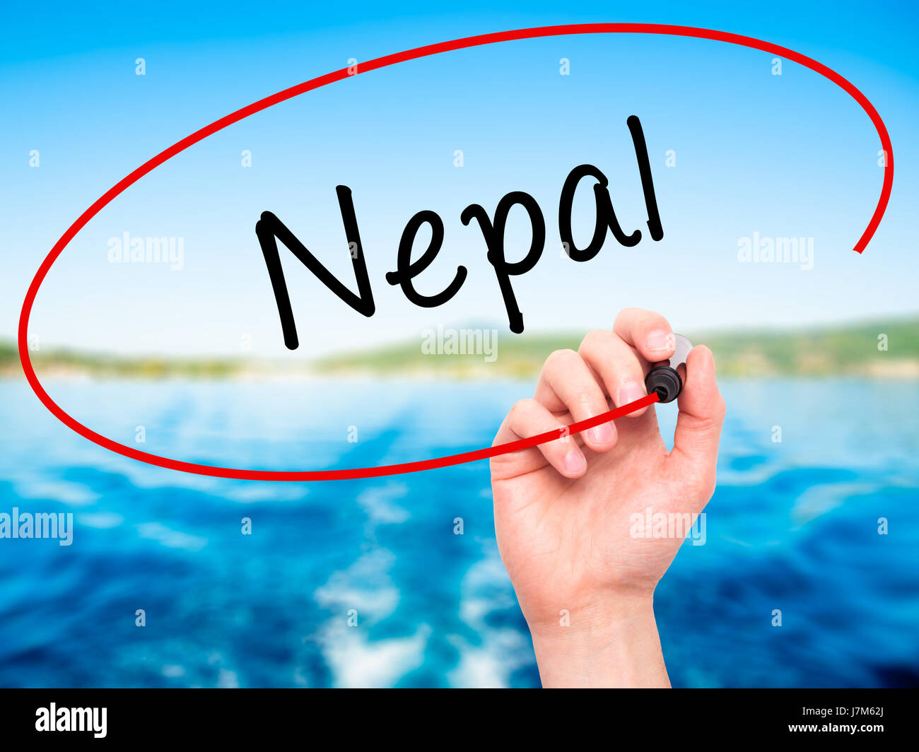 Man Hand writing Nepal with black marker on visual screen. Isolated on ...