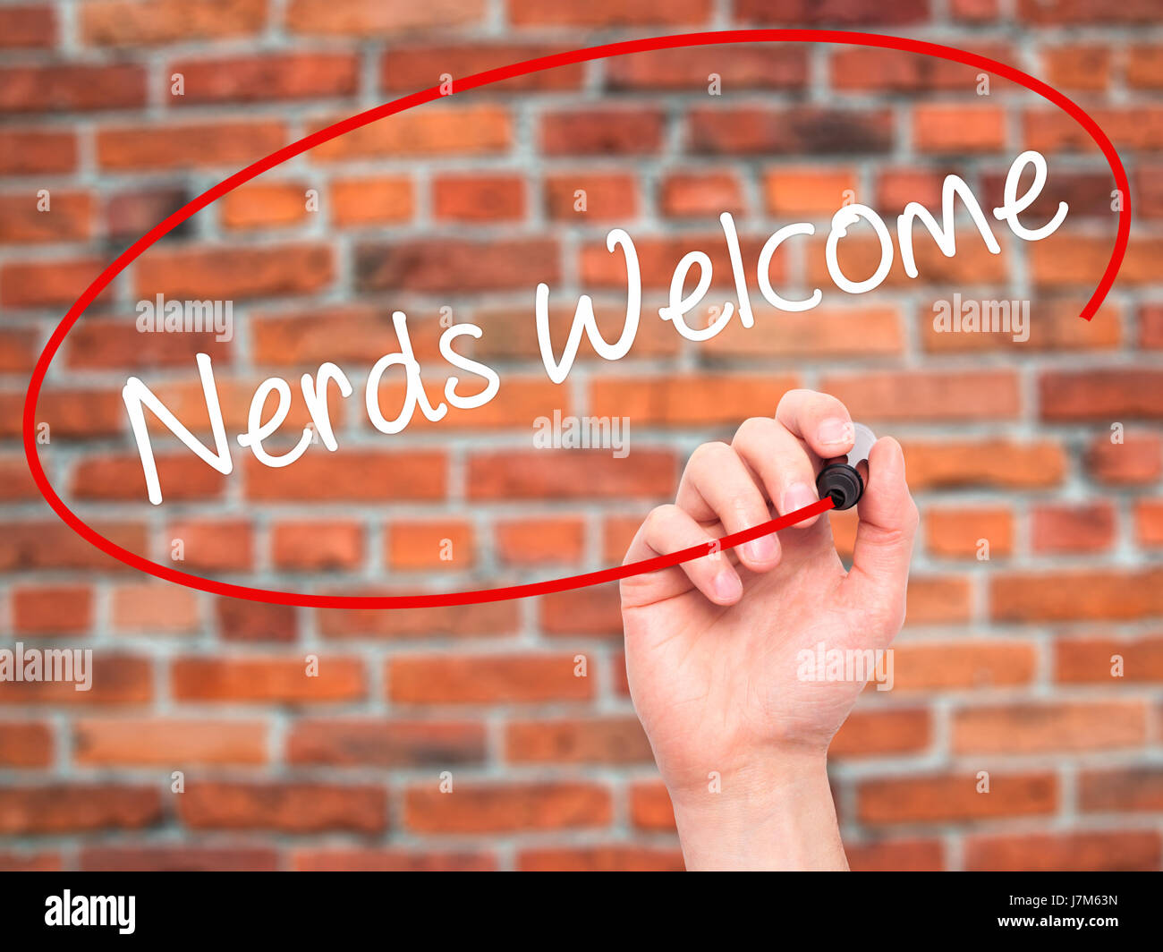 Man Hand writing Nerds Welcome with black marker on visual screen ...