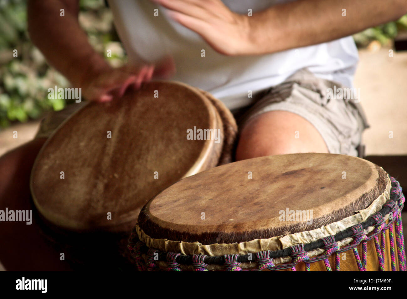 Men playing African style drums Stock Photo - Alamy