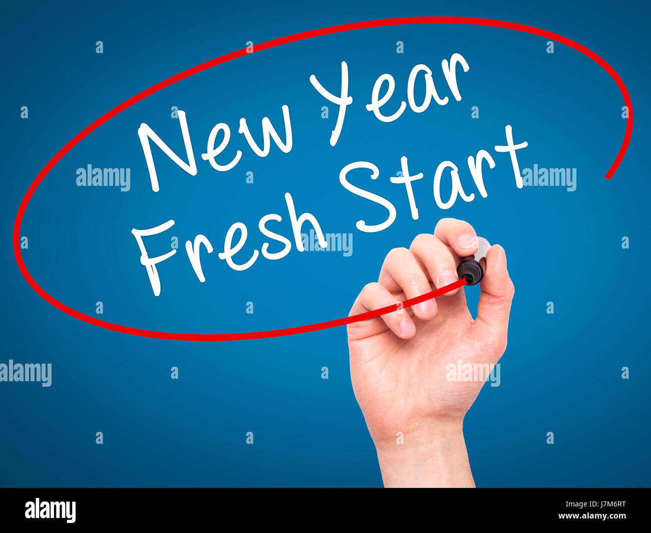 Man Hand writing New Year Fresh Start with black marker on visual ...