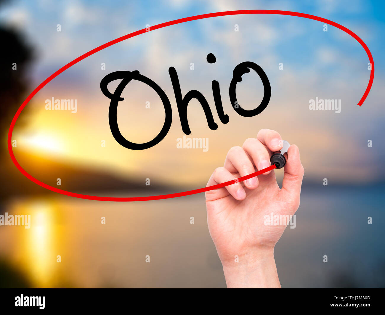 Man Hand writing Ohio with black marker on visual screen. Isolated on ...