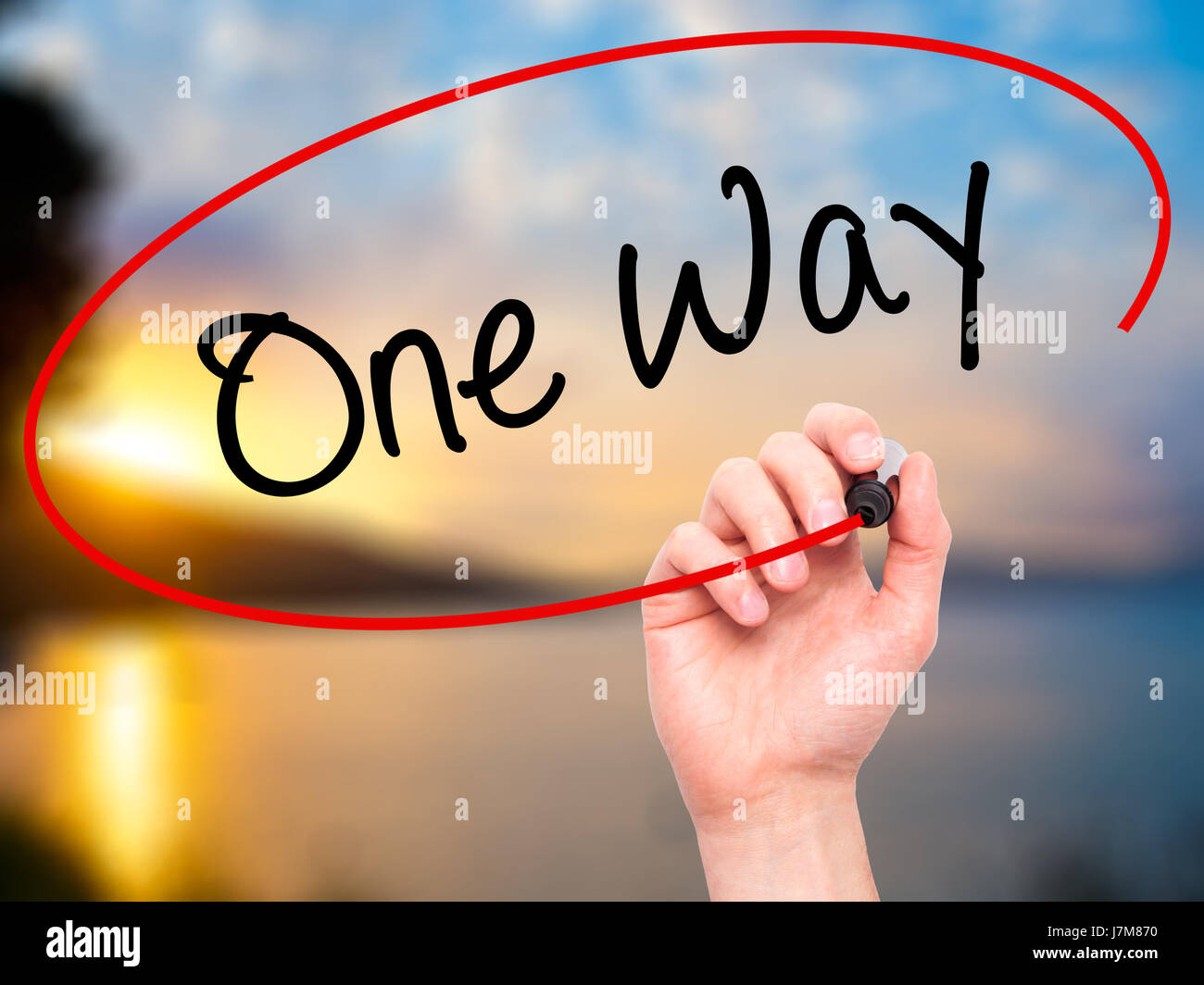 Man Hand writing One Way with black marker on visual screen. Isolated ...