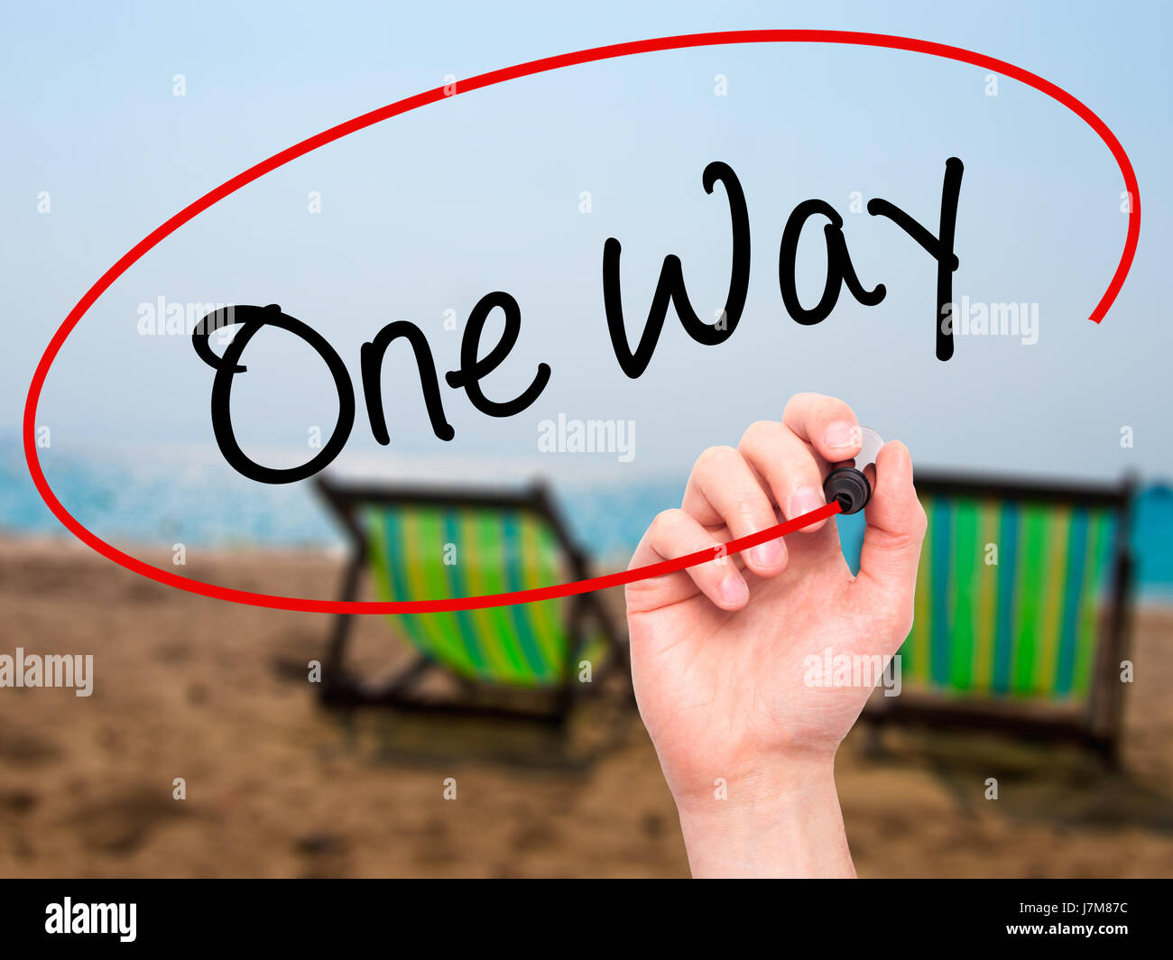 Man Hand writing One Way with black marker on visual screen. Isolated ...