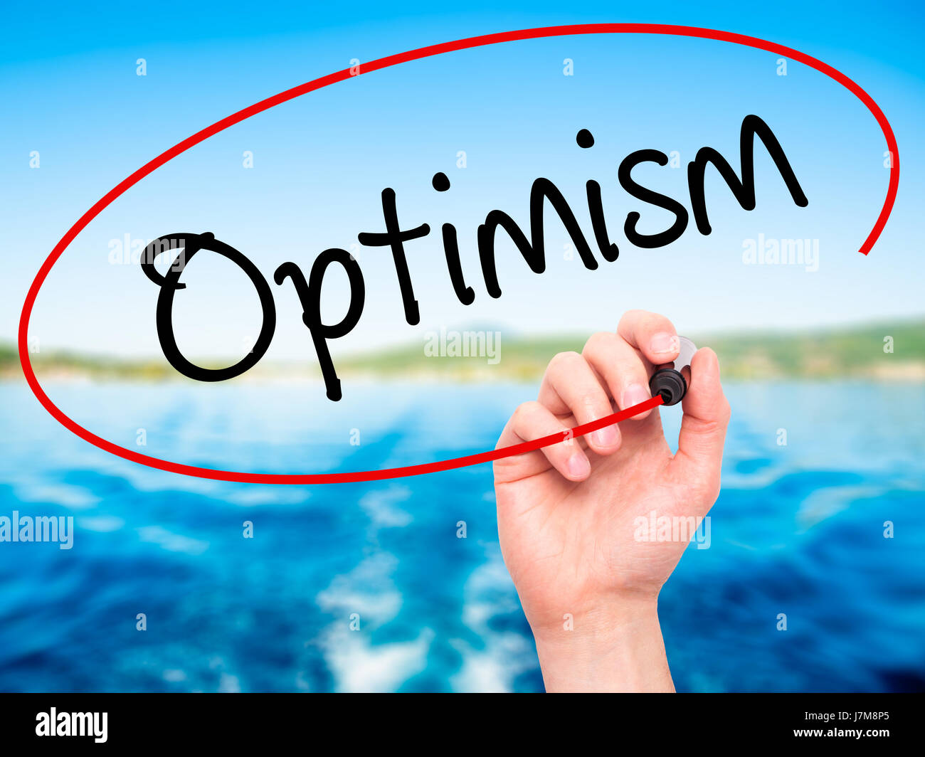 Man Hand writing Optimism with black marker on visual screen. Isolated ...