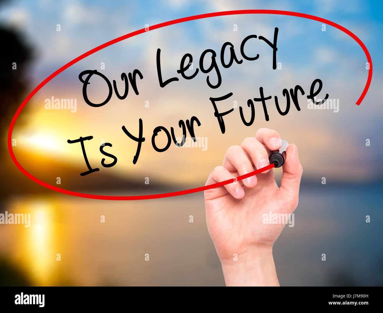 Man Hand writing Our Legacy Is Your Future with black marker on visual ...