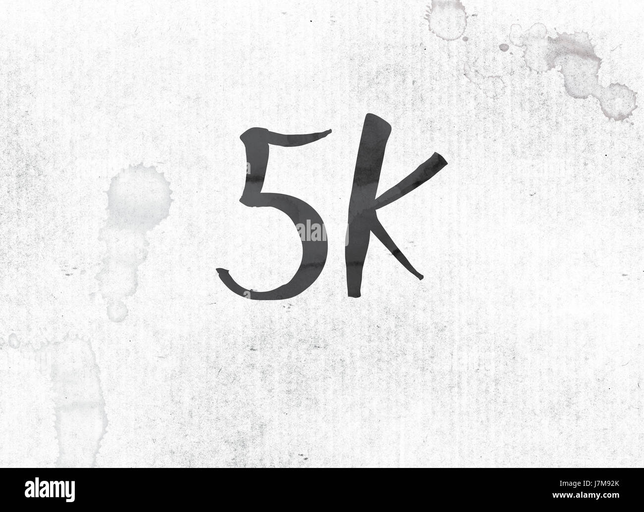 The word 5K concept and theme painted in black ink on a watercolor wash ...