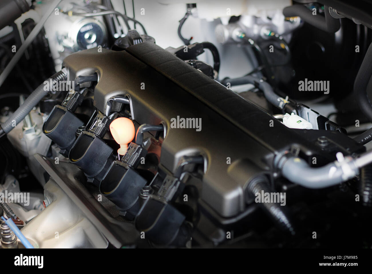 NEW Car engine part. Modern powerful car engine. The powerful engine of ...