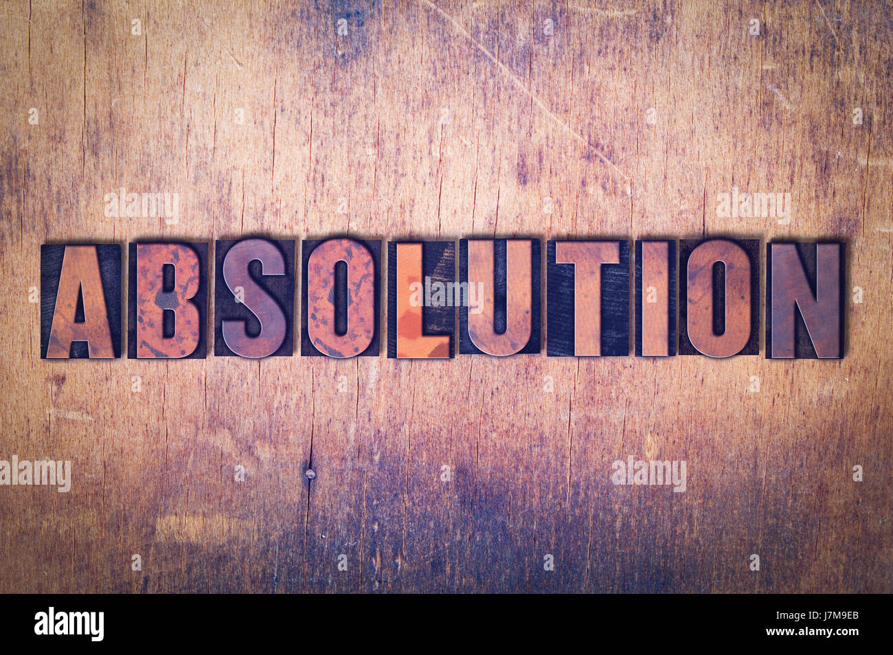 The word Absolution concept and theme written in vintage wooden ...