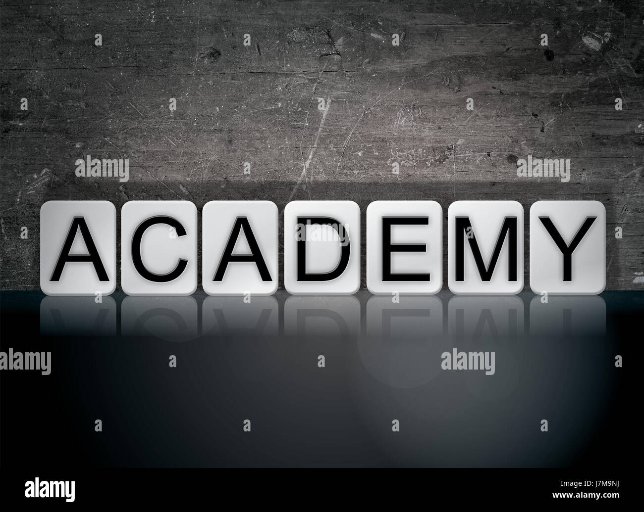 The word Academy concept and theme written in white tiles on a dark ...