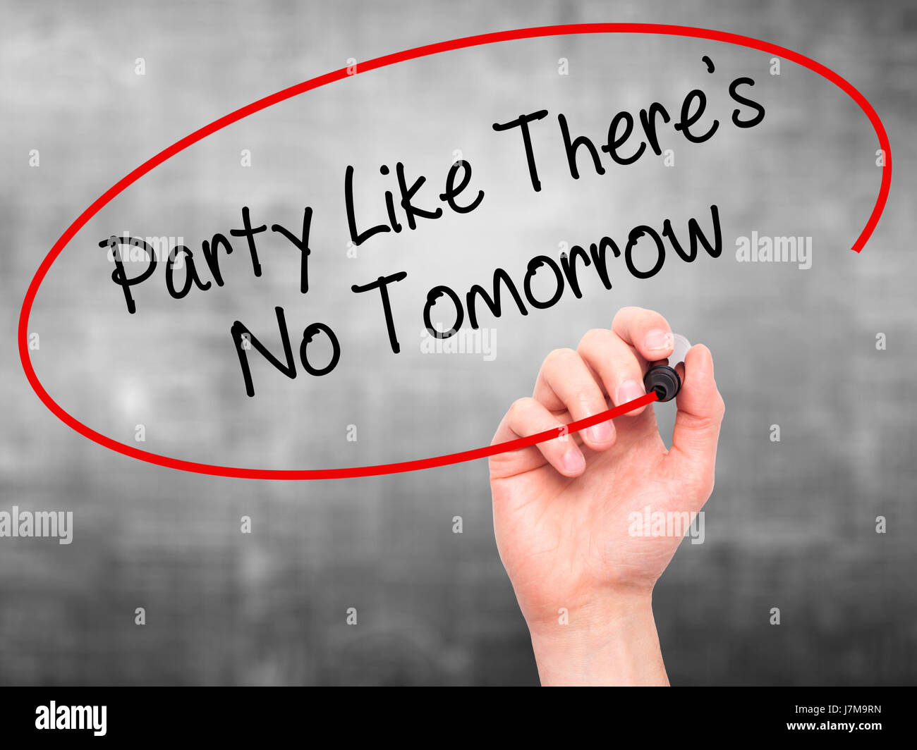 Man Hand writing Party Like There's No Tomorrow with black marker on ...