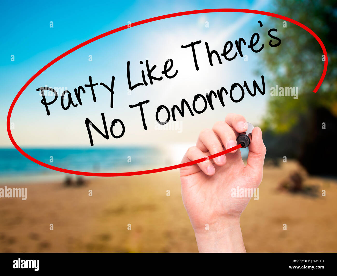 Man Hand writing Party Like There's No Tomorrow with black marker on ...