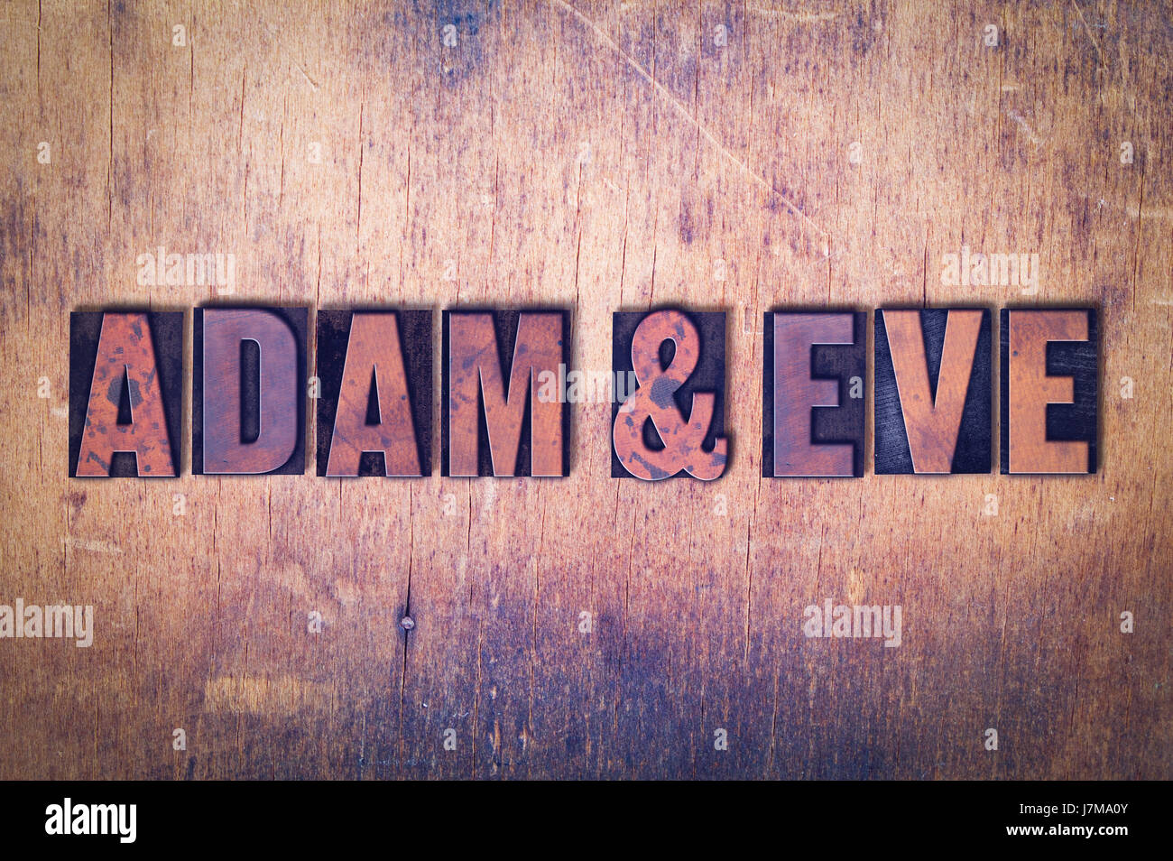 Adam and Eve concept and theme written in vintage wooden letterpress ...
