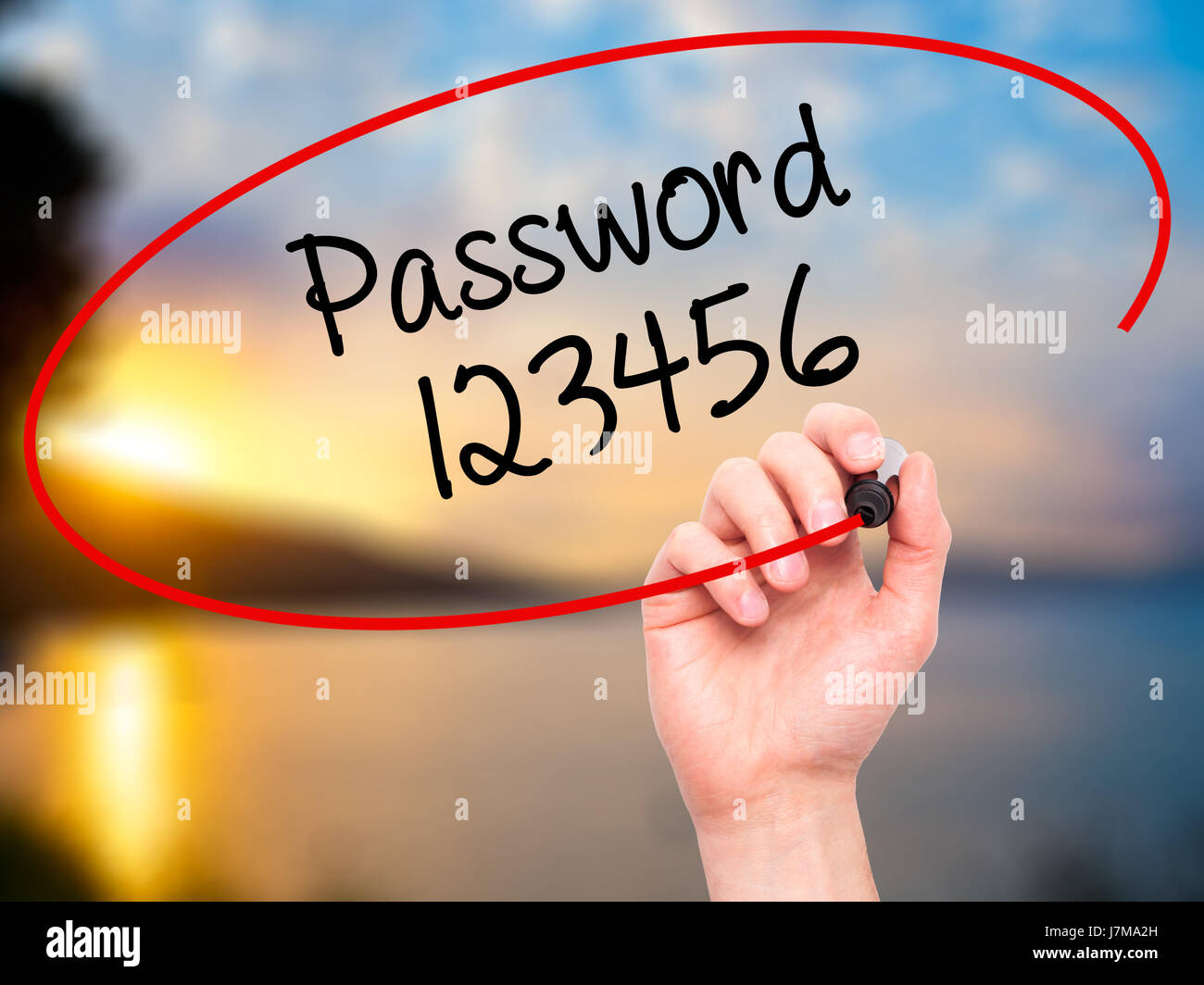 Man Hand writing Password 123456 with black marker on visual screen ...