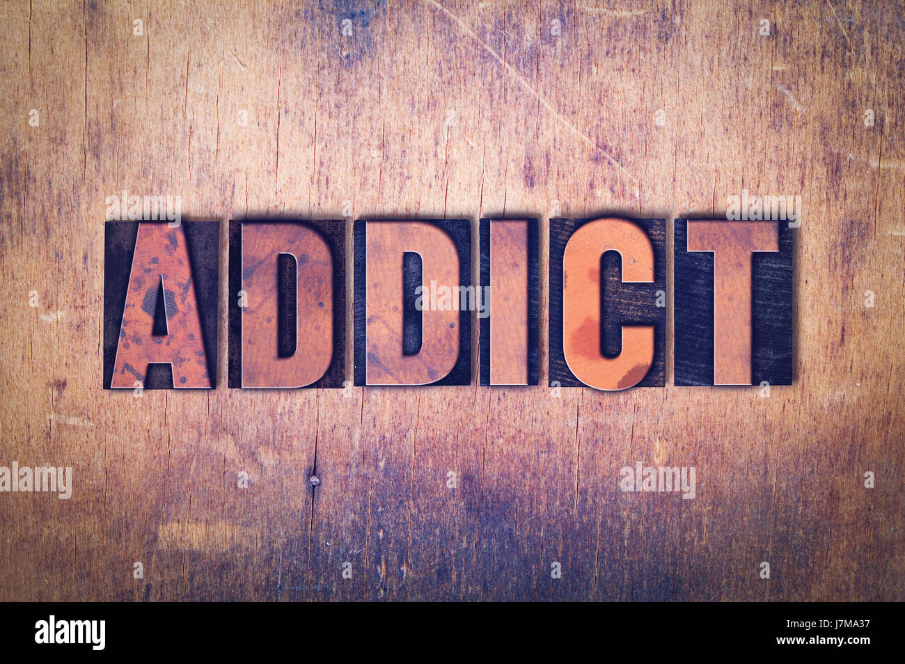 The word Addict concept and theme written in vintage wooden letterpress ...