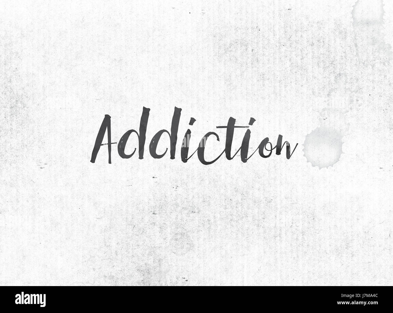 The word Addiction concept and theme painted in black ink on a ...
