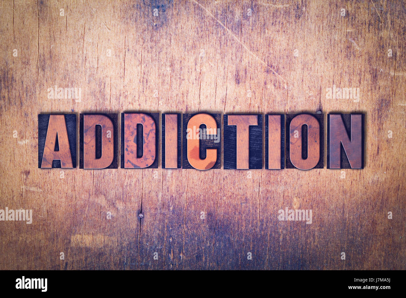 The word Addiction concept and theme written in vintage wooden ...