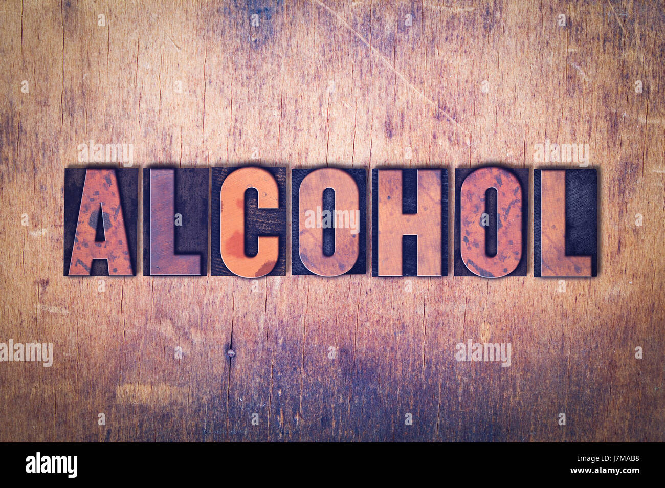 The word Alcohol concept and theme written in vintage wooden ...