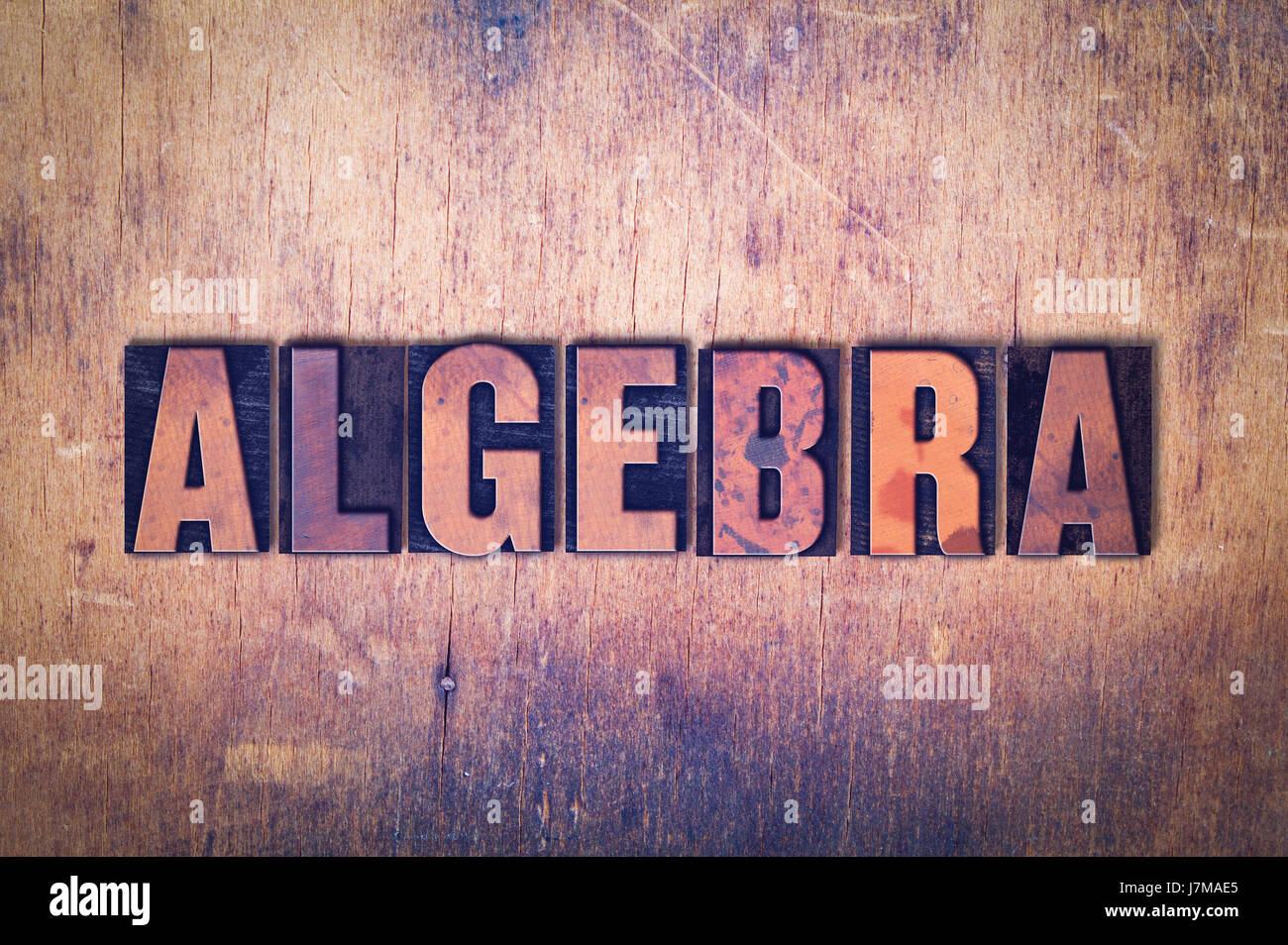 The word Algebra concept and theme written in vintage wooden ...