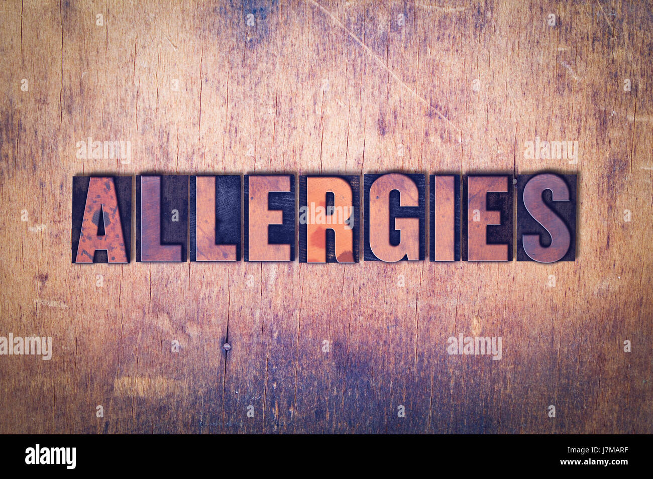 The word Allergies concept and theme written in vintage wooden ...