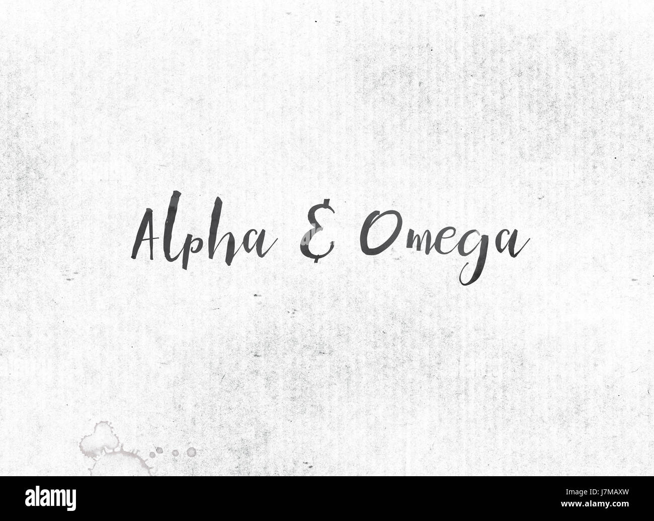 The words Alpha and Omega concept and theme painted in black ink on a ...
