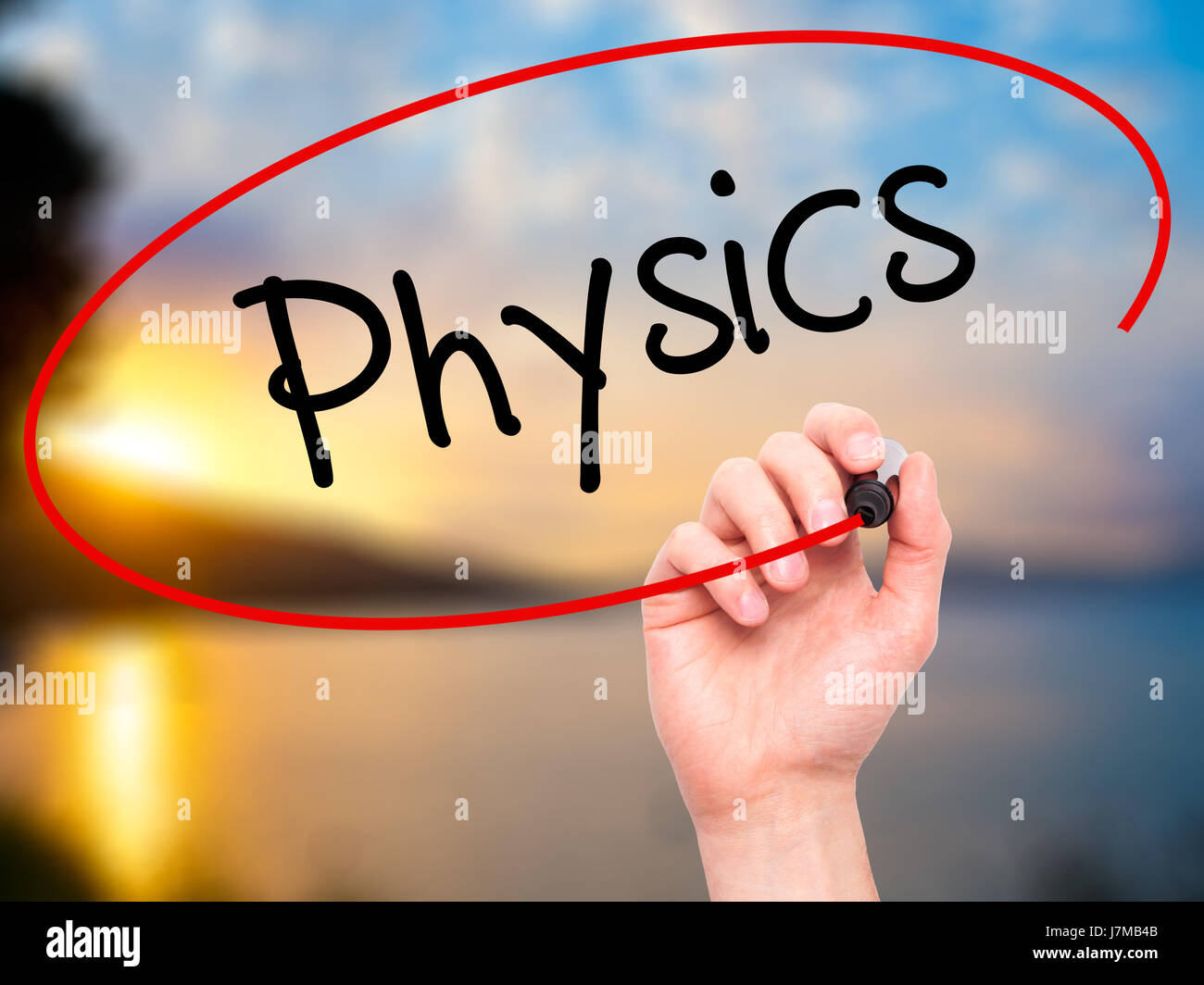 Man Hand writing Physics with black marker on visual screen. Isolated ...