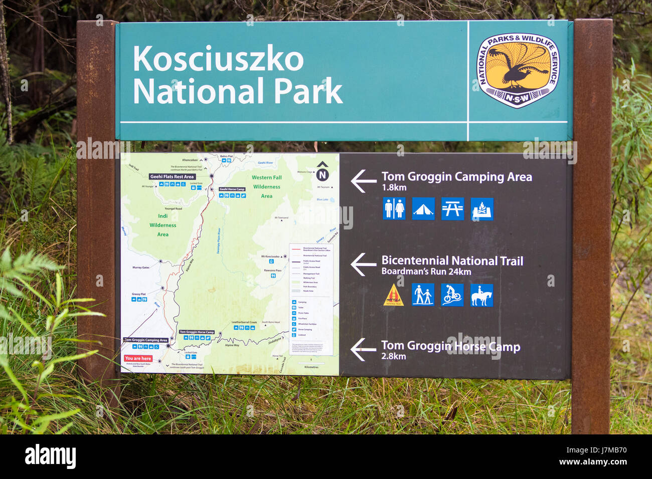 Kosciuszko National Park direction sign board showing Tom Groggin ...