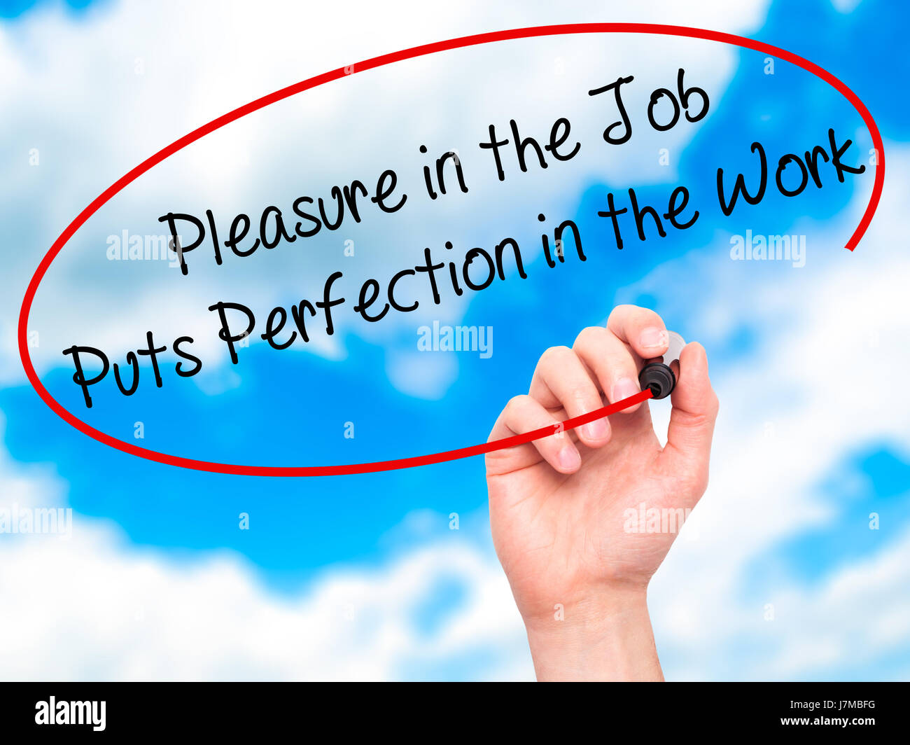 Man Hand writing Pleasure in the Job Puts Perfection in the Work with ...