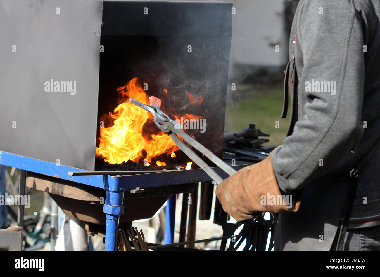 glowing forge iron,hot ironforge Stock Photo - Alamy