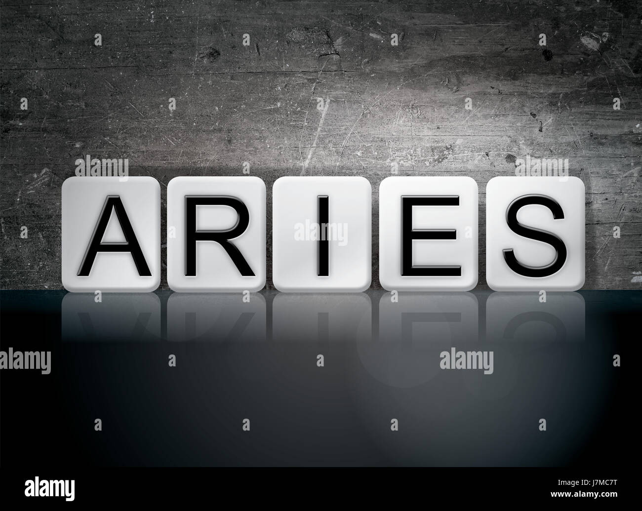The word Aries concept and theme written in white tiles on a dark ...