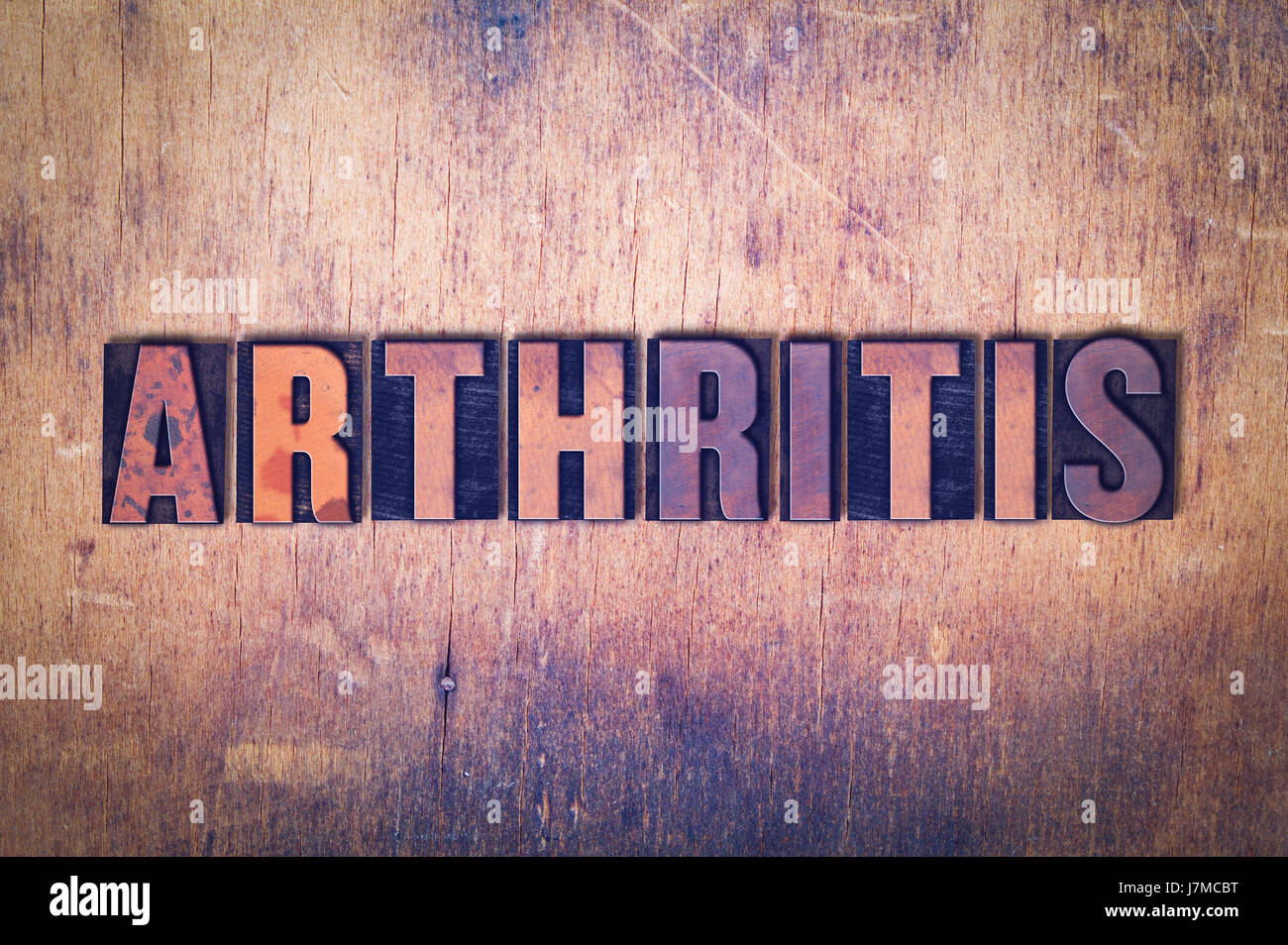 The word Arthritis concept and theme written in vintage wooden ...