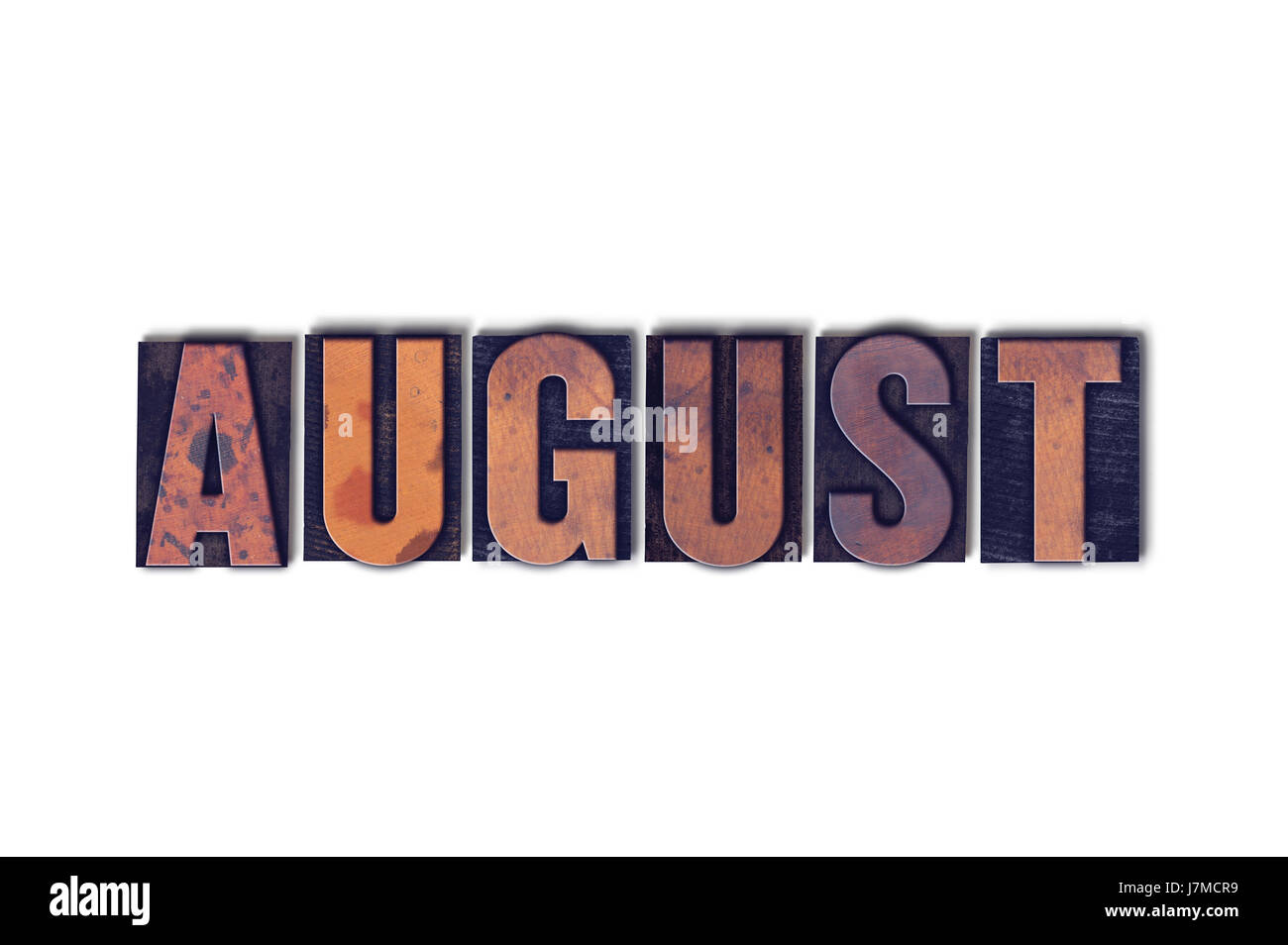 The word August concept and theme written in vintage wooden letterpress ...