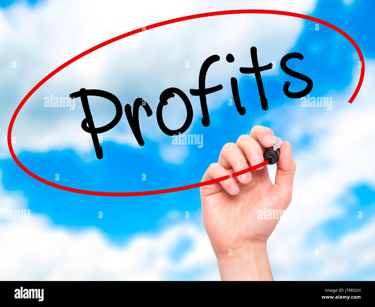 Man Hand writing Profits with black marker on visual screen. Isolated ...