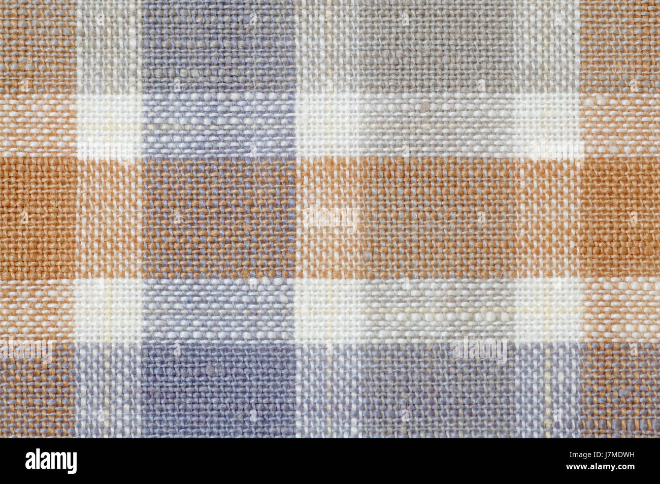 Close up seamless checked brown and purple fabric pattern texture ...