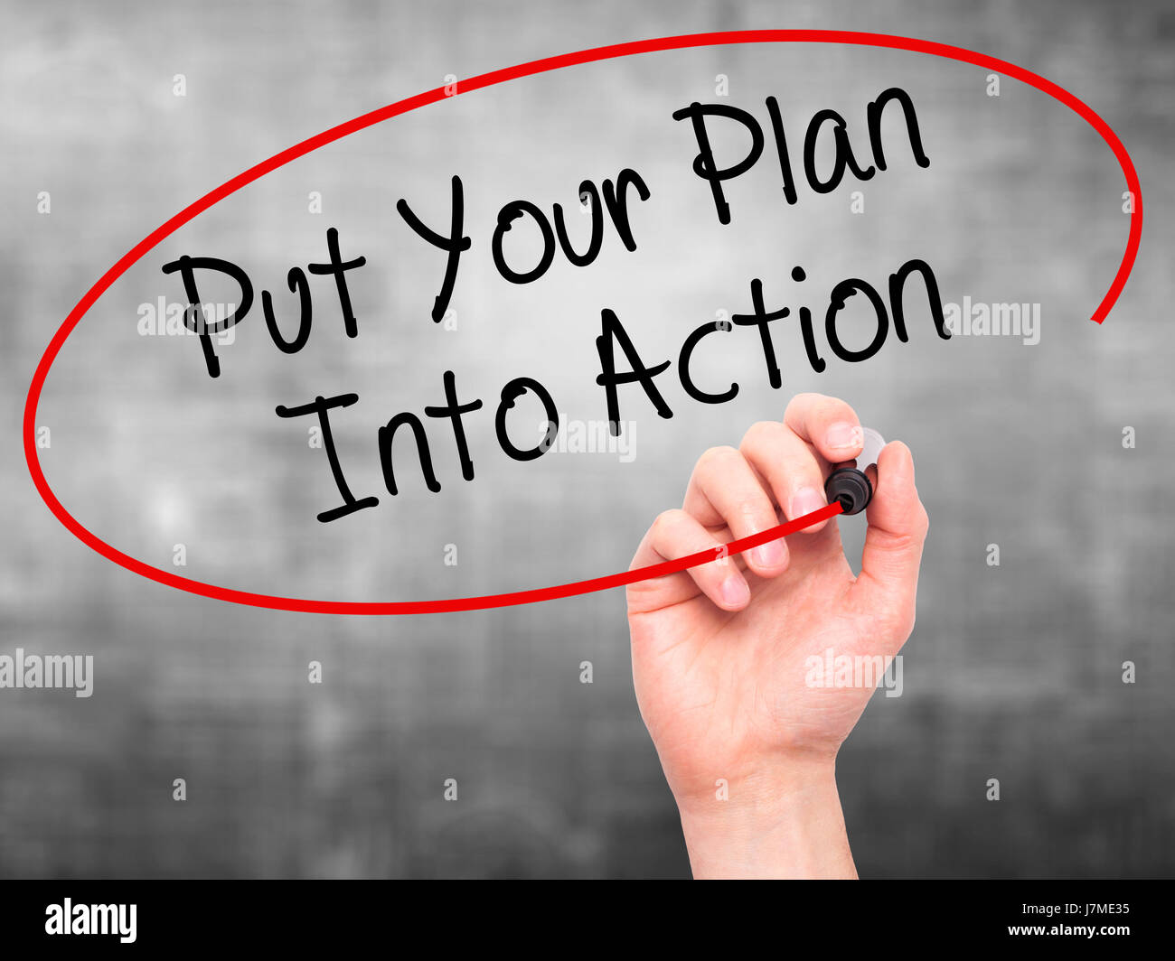 Man Hand writing Put Your Plan Into Action with black marker on visual ...