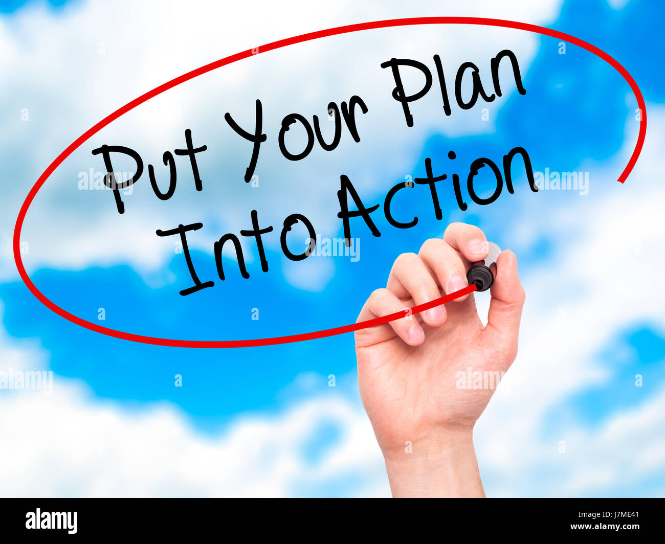 Man Hand writing Put Your Plan Into Action with black marker on visual ...