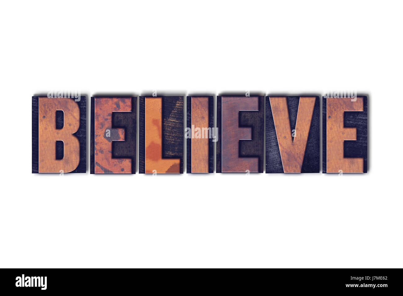 The word Believe concept and theme written in vintage wooden ...