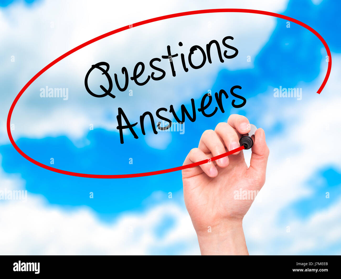 Man Hand writing Questions Answers with black marker on visual screen ...