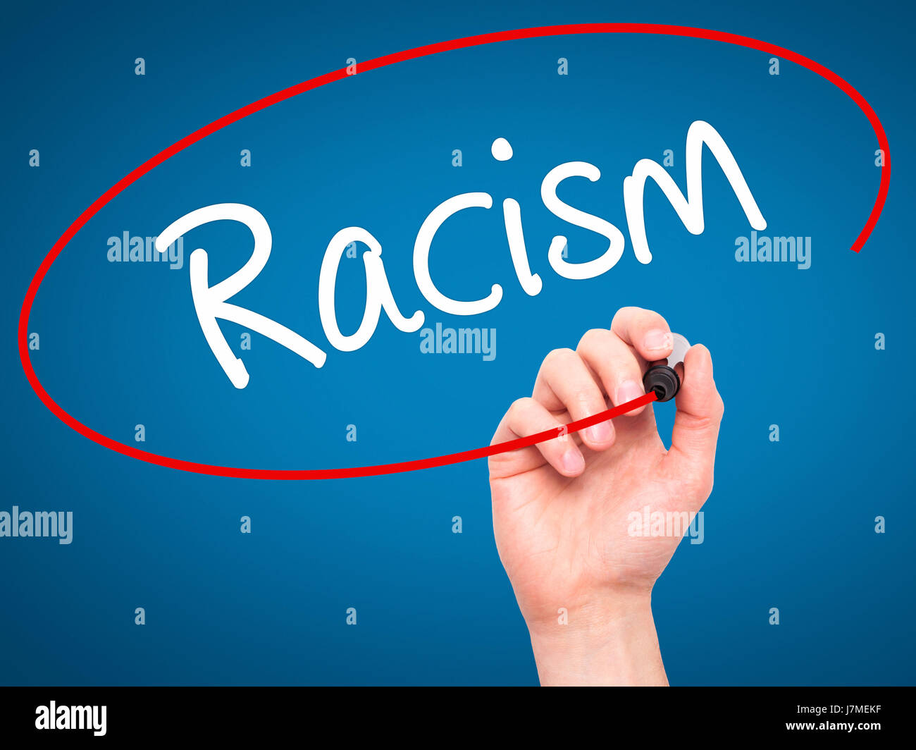 Man Hand writing Racism with black marker on visual screen. Isolated on ...