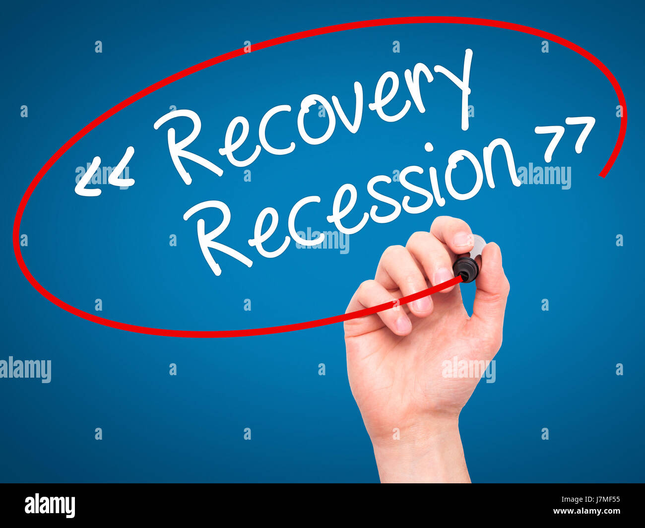 Man Hand writing Recovery - Recession with black marker on visual ...