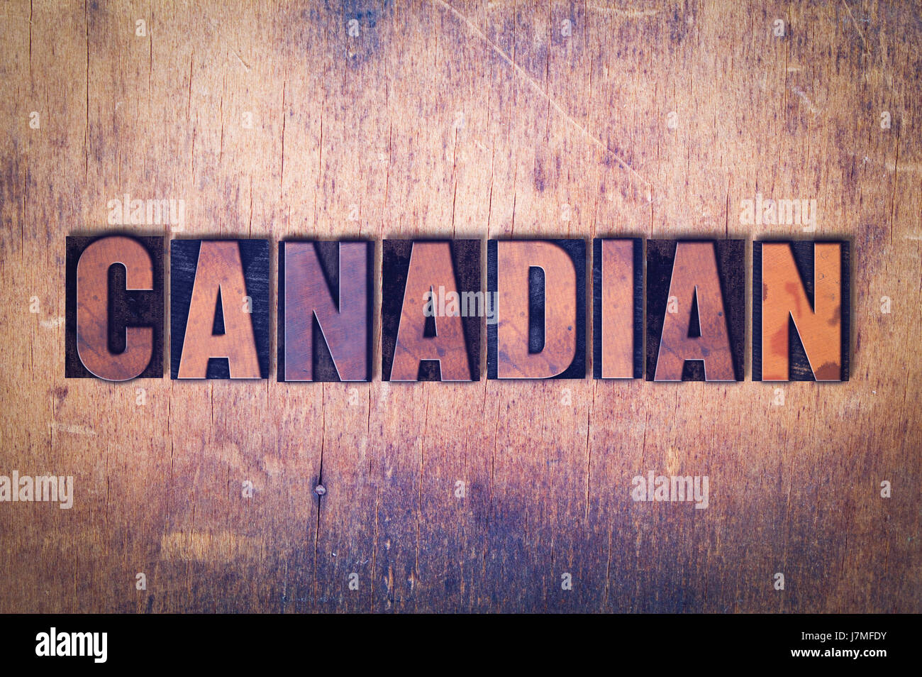 The word Canadian concept and theme written in vintage wooden ...