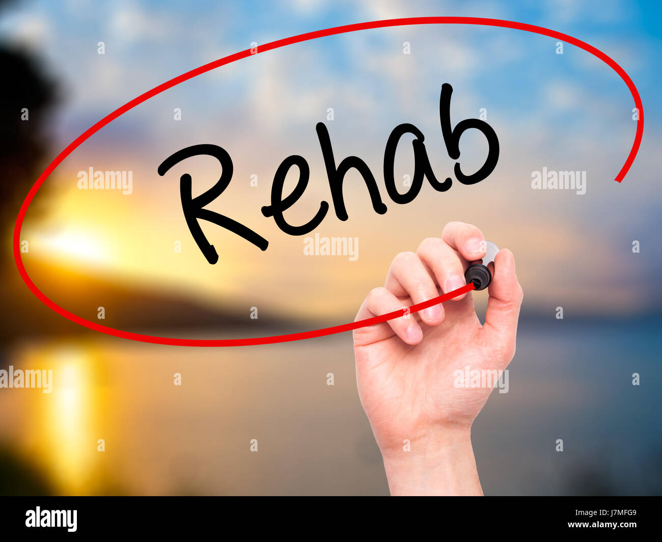 Man Hand writing Rehab with black marker on visual screen. Isolated on ...