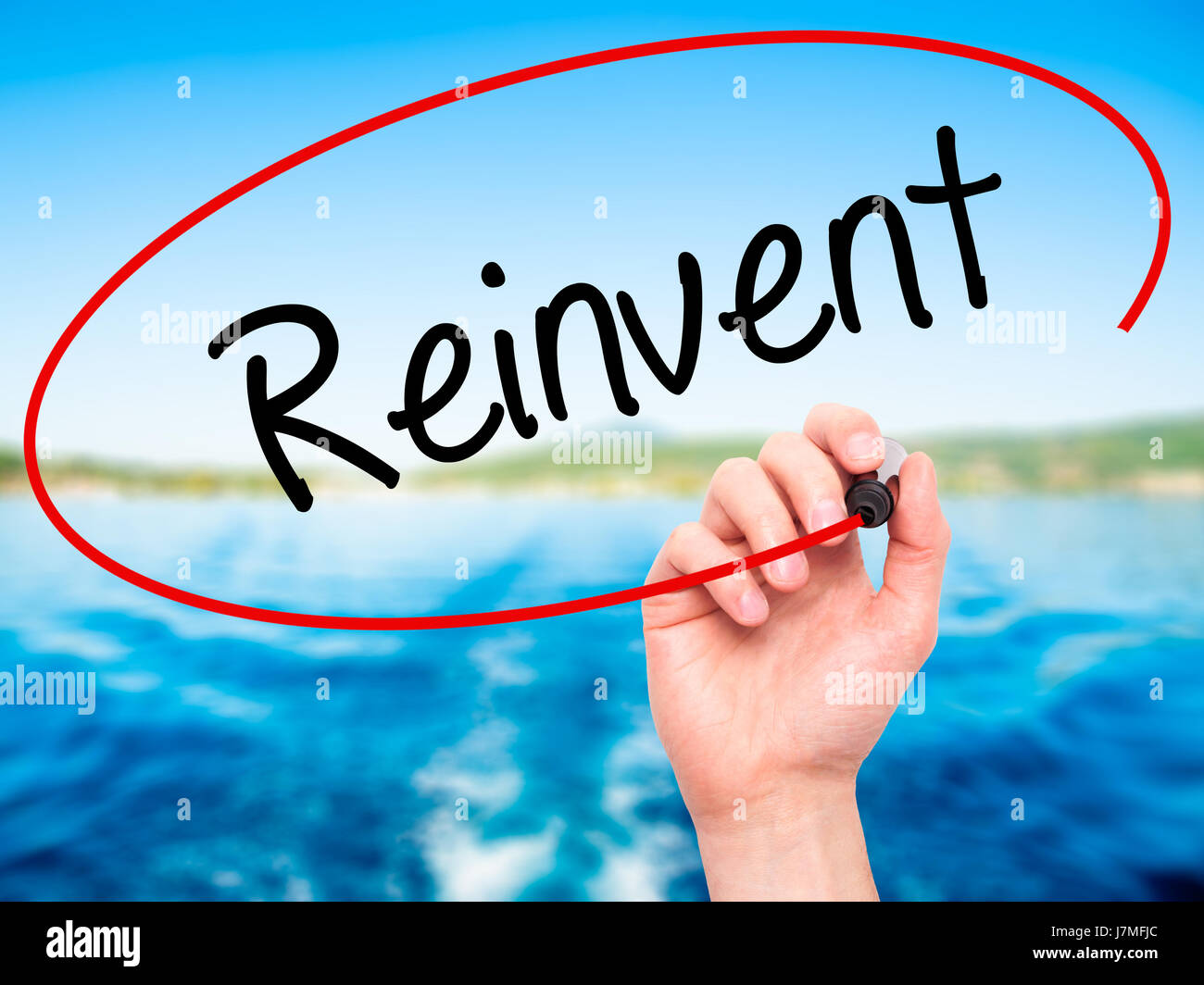 Man Hand writing Reinvent with black marker on visual screen. Isolated ...