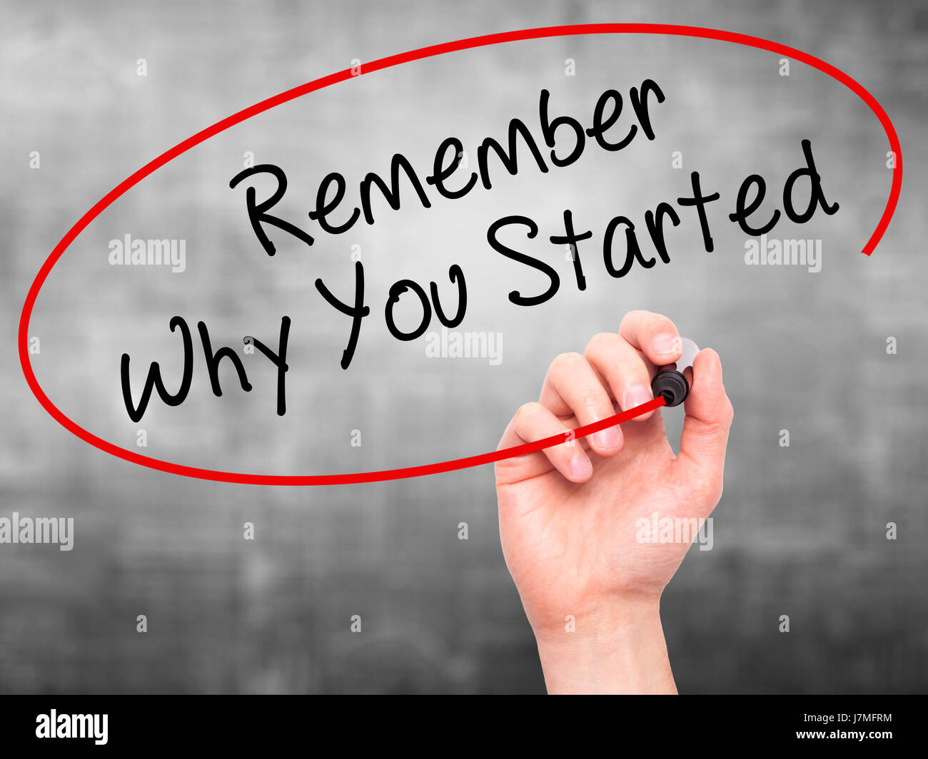 Man Hand writing Remember Why You Started with black marker on visual ...